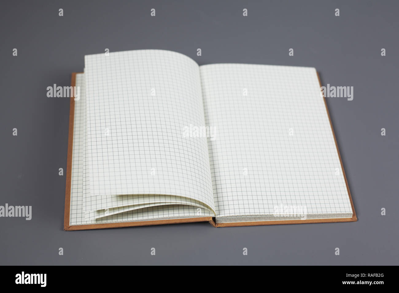 open notebook lies on the desk in the office Stock Photo - Alamy