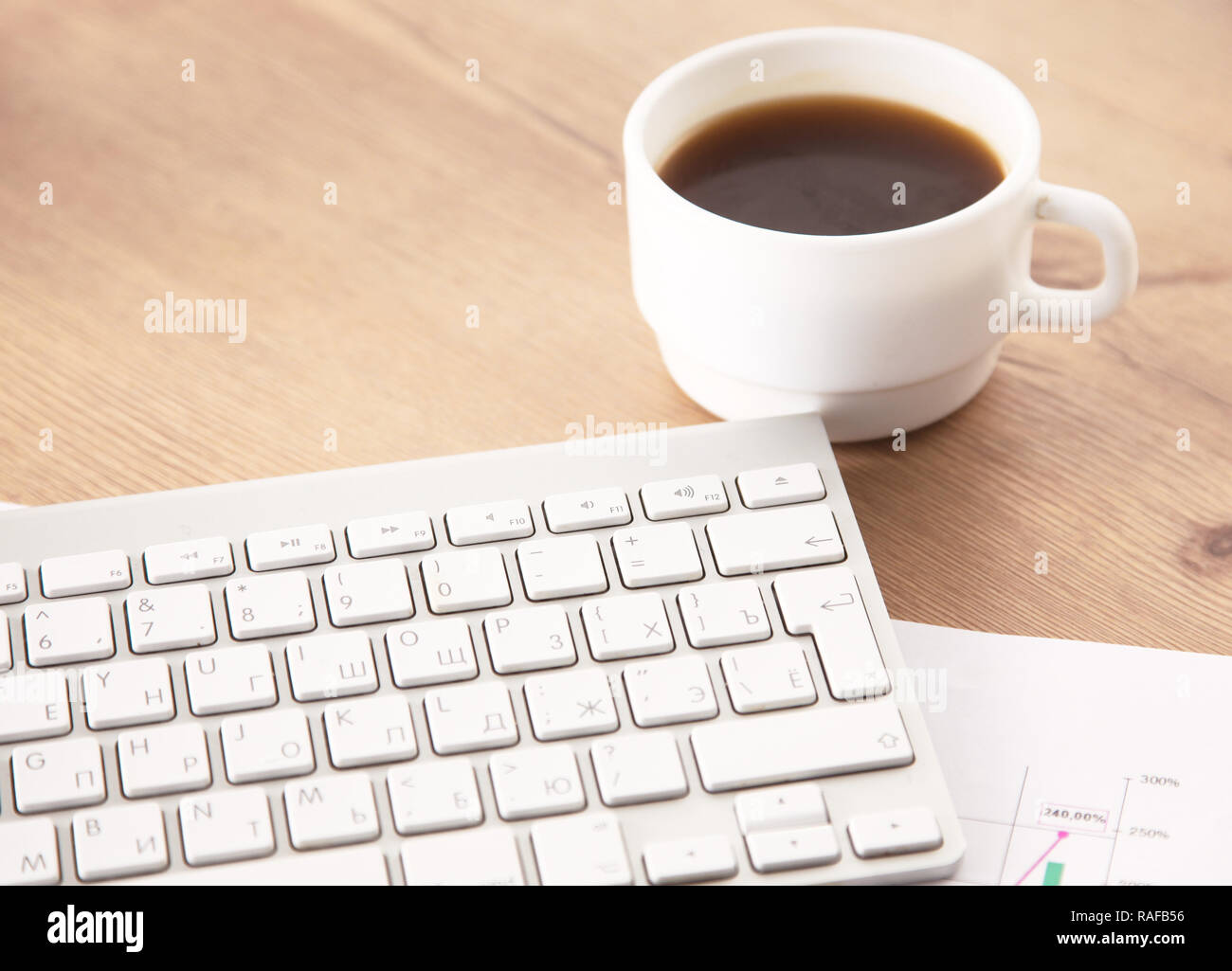 A cup of coffee on the office table Stock Photo - Alamy