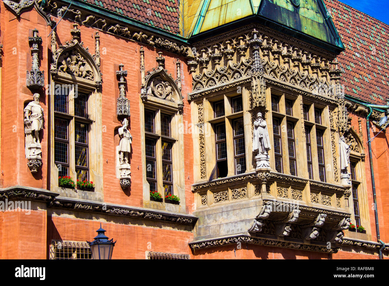 Detail of the facade of the gothic Old Town Hall on market square in ...