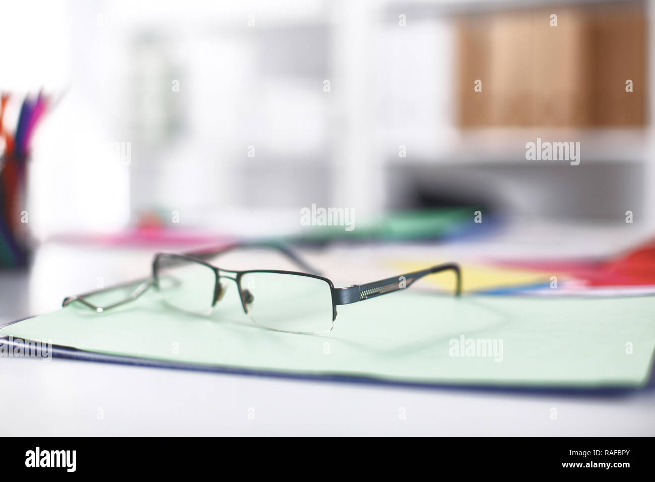Workspace desktop, documents on the office table Stock Photo - Alamy
