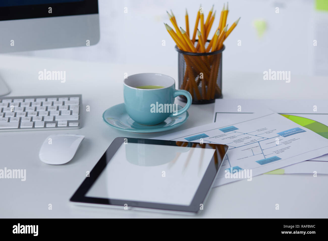 A cup of coffee on the office table Stock Photo - Alamy