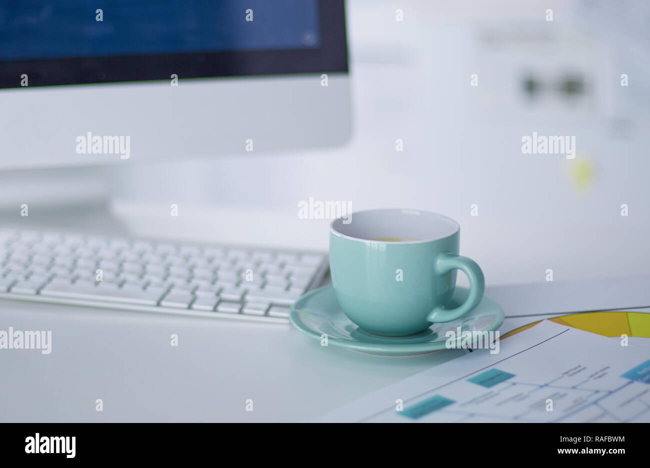 A cup of coffee on the office table Stock Photo - Alamy