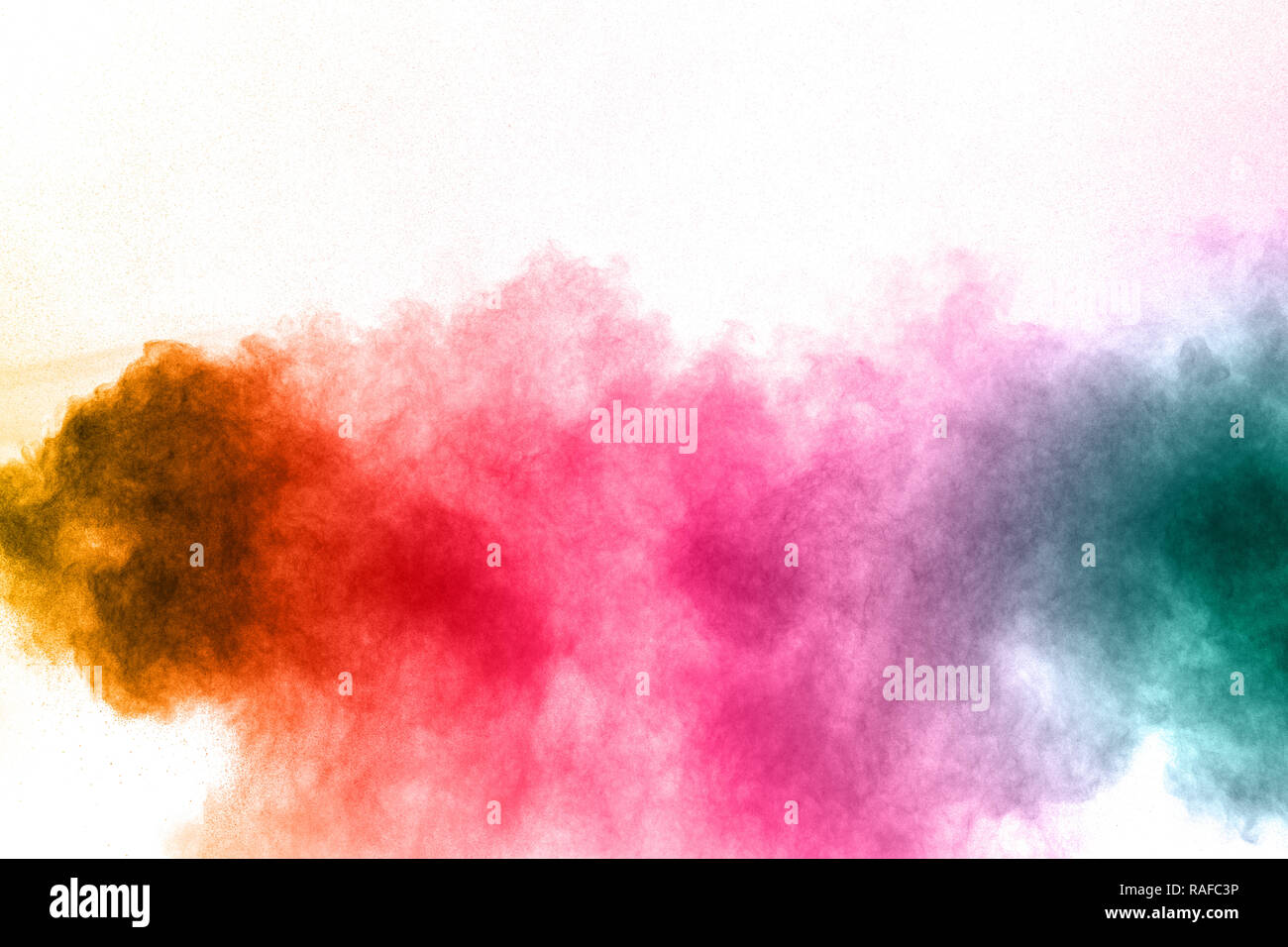 Multi color powder explosion on white background Stock Photo - Alamy