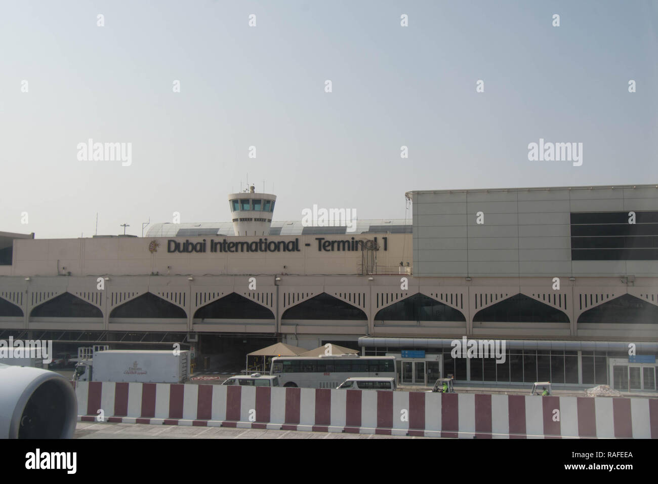 Dubai Airport front entrance control tower sign signs arches arch ...