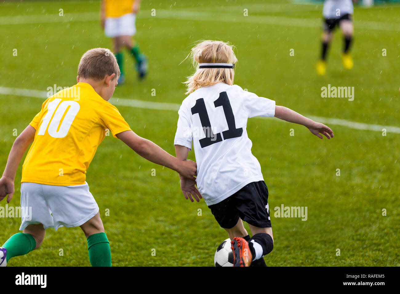 Kids Play Soccer Game. Children Outdoor Football Tournament Match on ...