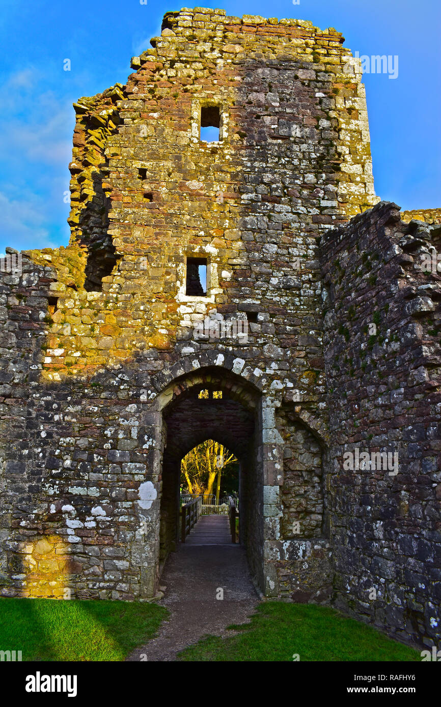 The historic remains of Coity Castle nr Bridgend, in the warm glow of ...