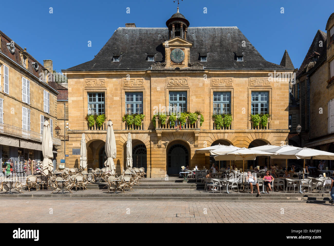 Sarlat, France - September 2, 2018: Historic houses surrounding Place ...