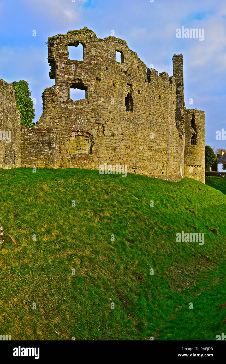 The historic remains of Coity Castle nr Bridgend, in the warm glow of ...