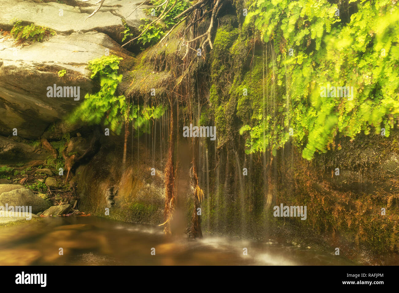 Pithara waterfall at Andros. A beautiful summer destination Stock Photo ...