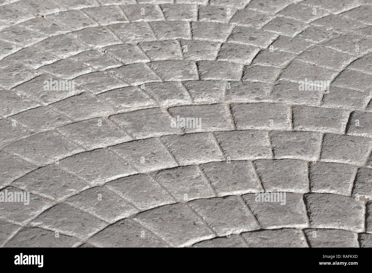 The road is paved with gray sets with solar modulations. Road surface ...