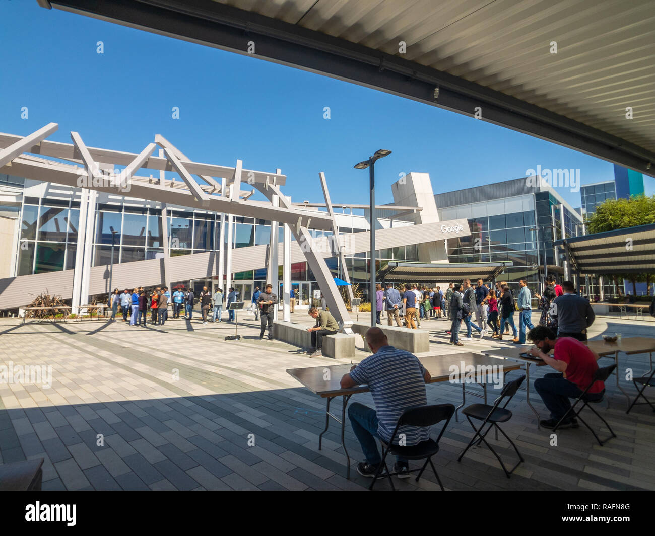 Employees working outdoors at Googleplex headquarters main office Stock ...