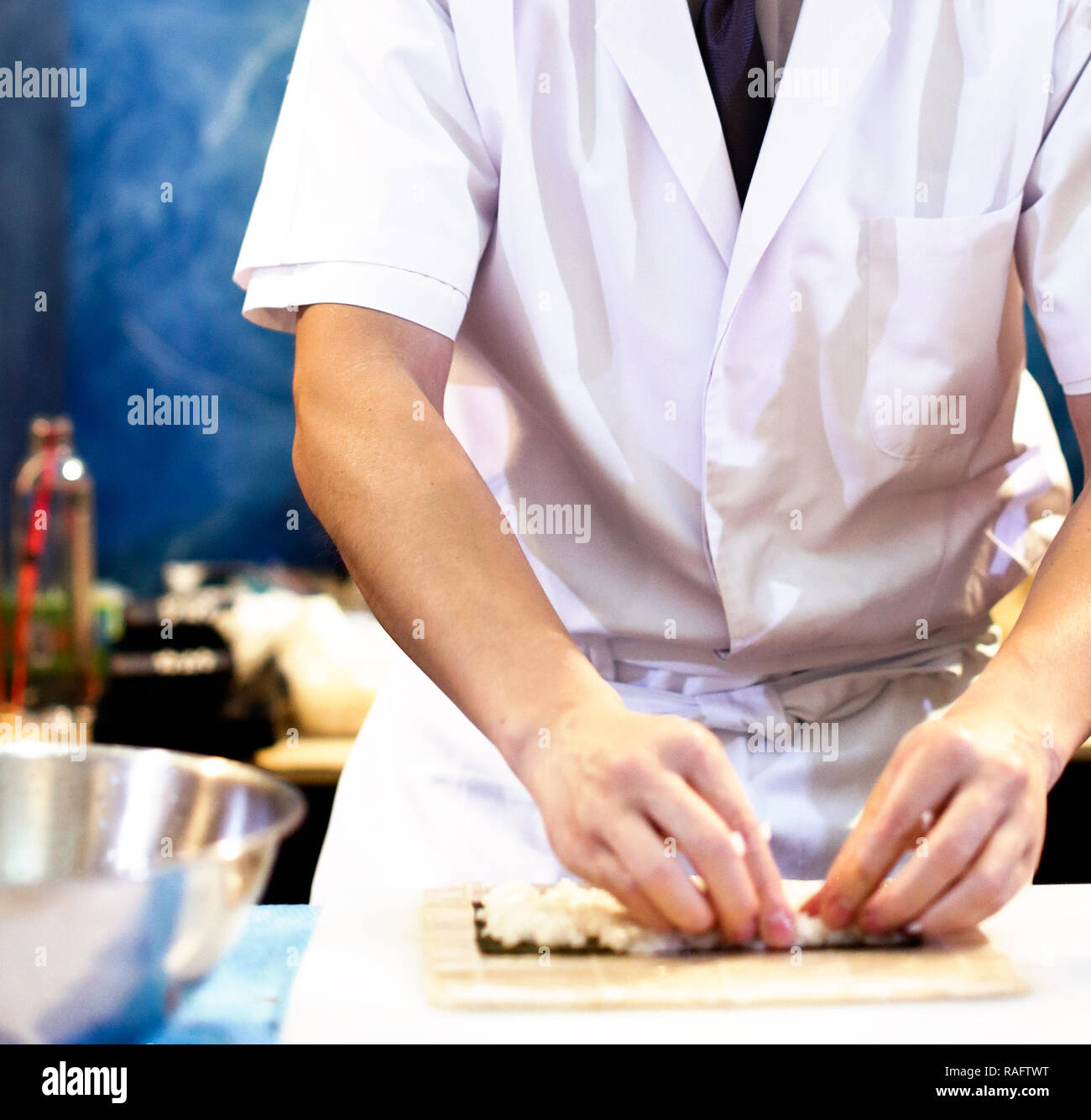 chef hands preparing japanese food, chef making sushi, Preparing Sushi ...