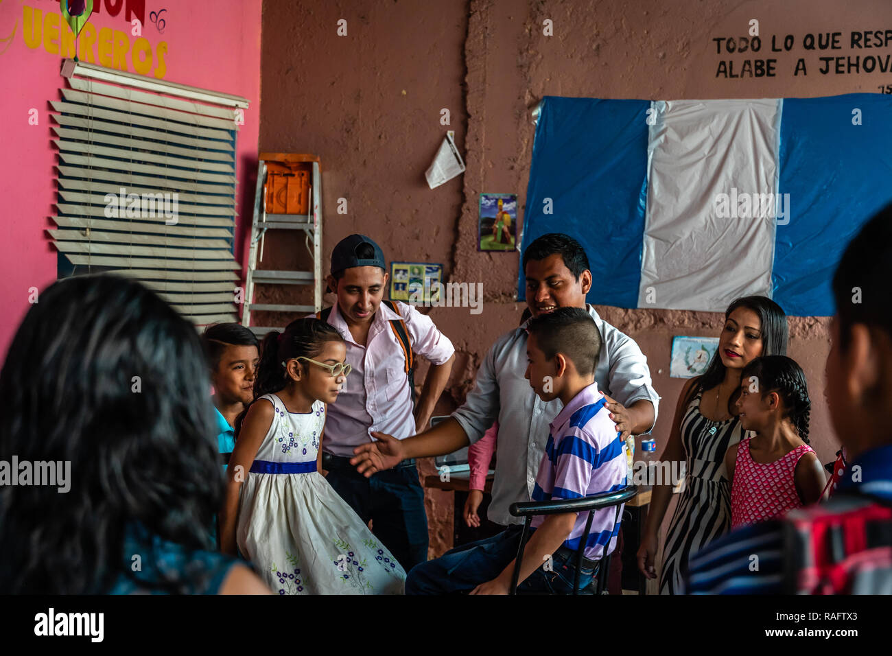 latin children playing games in Guatemala Stock Photo - Alamy