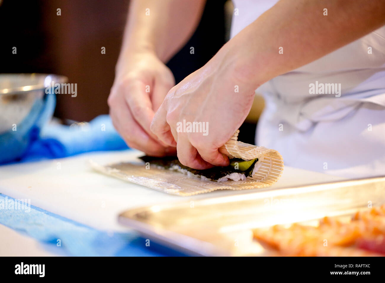 Woman making sushi hi-res stock photography and images - Alamy