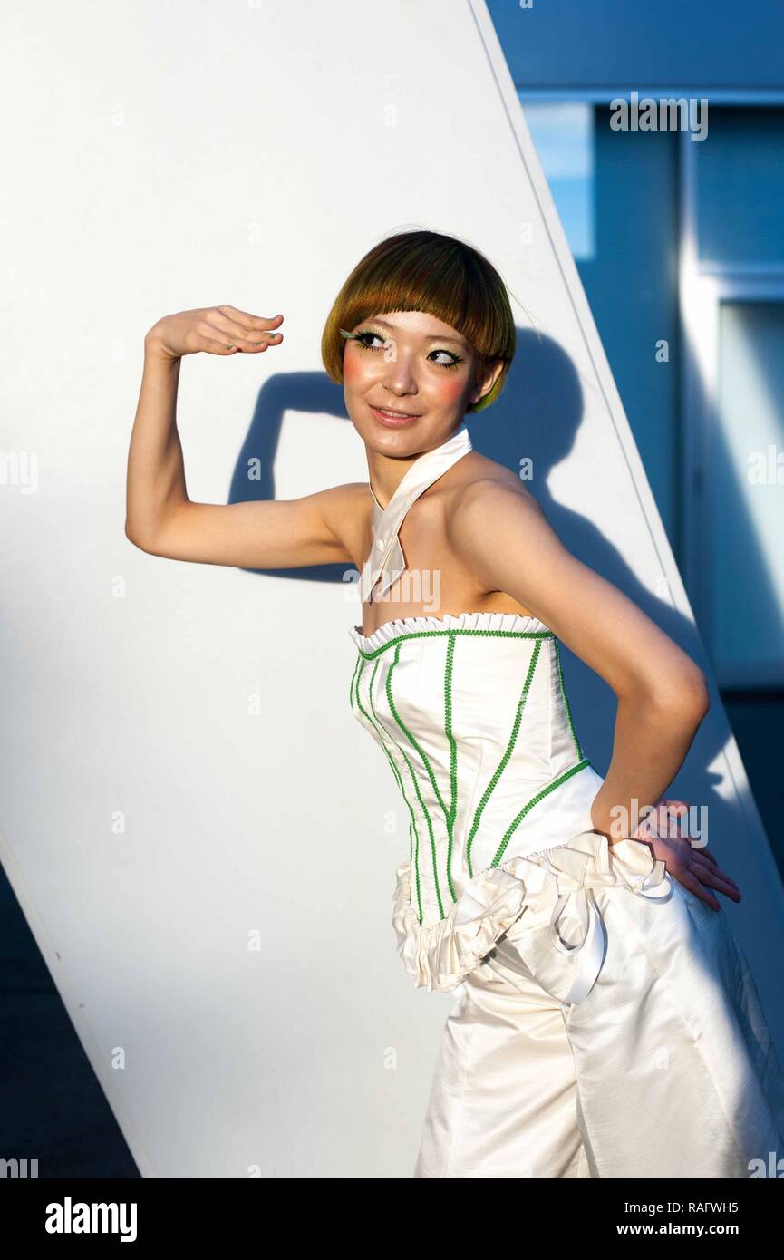 Asian female model poses for pictures at the hair cut Stock Photo - Alamy
