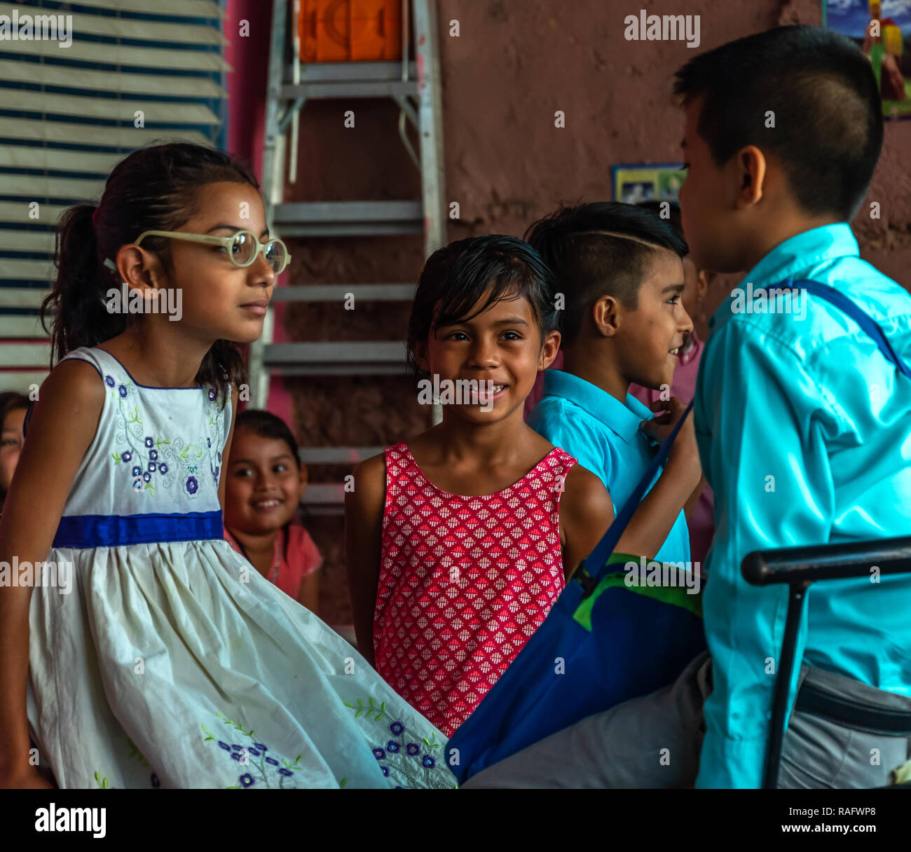 latin children playing games in Guatemala Stock Photo - Alamy