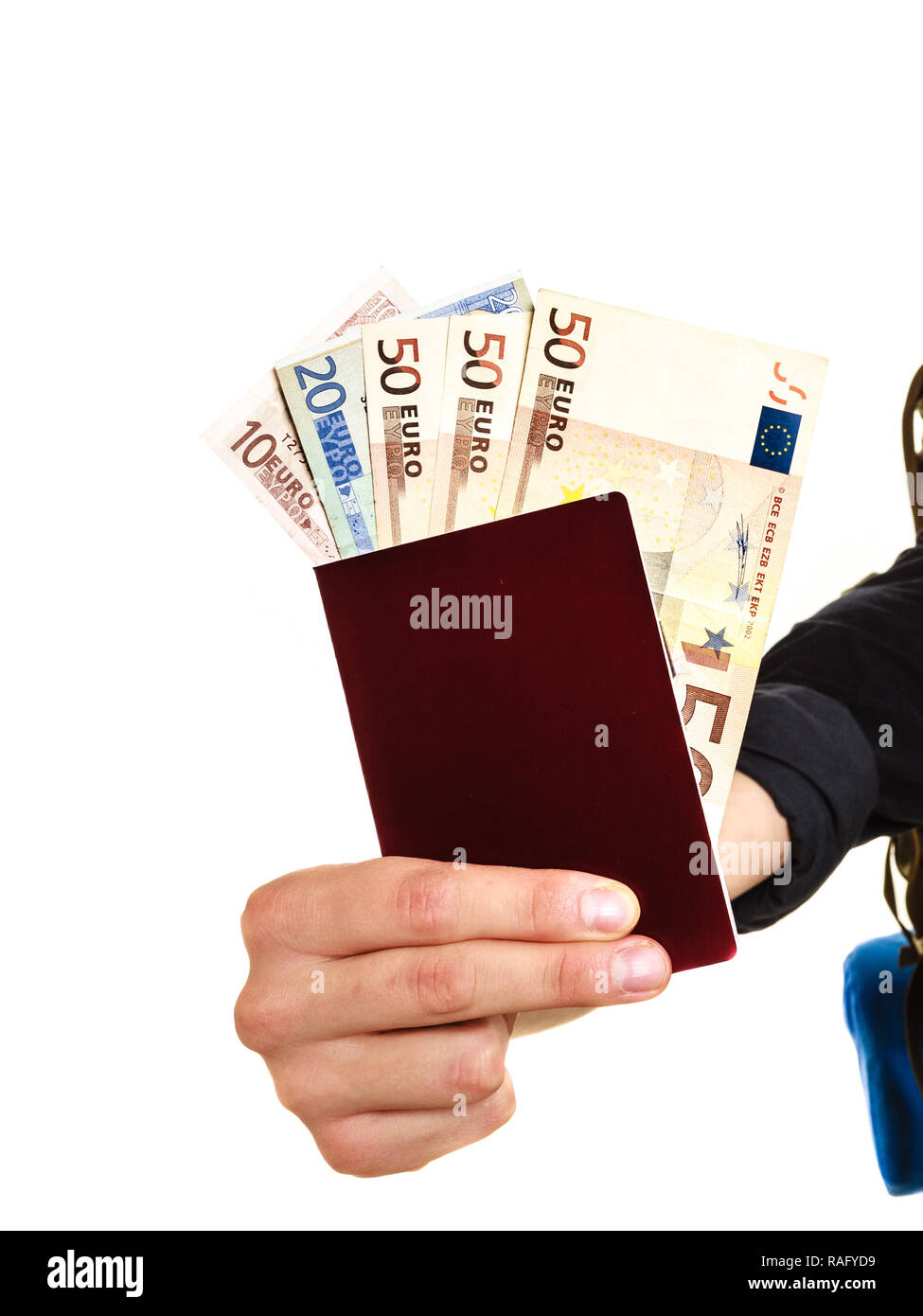 Human tourist hand holding passport full of money. Summer vacation ...