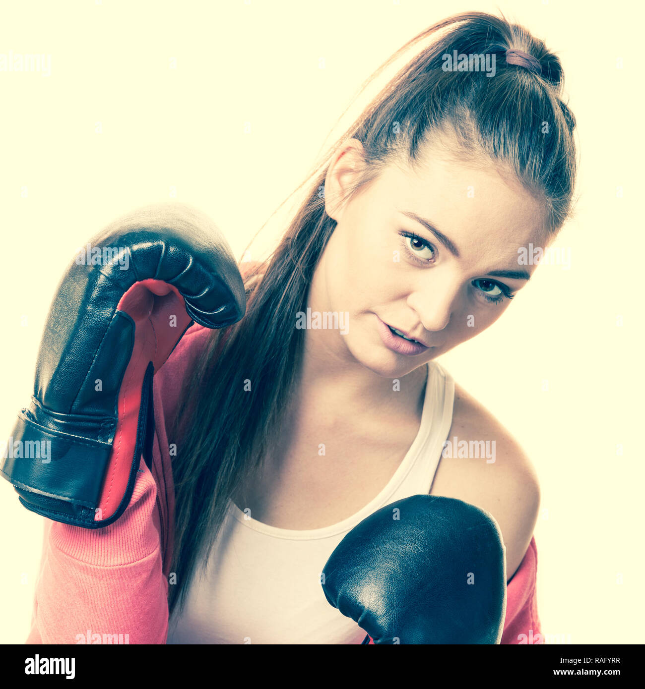 Emancipation and feminist. Defense concept. Young fit woman boxing ...