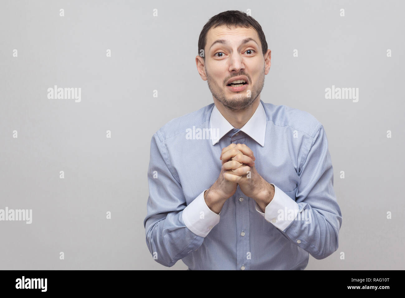 Businessman hands in prayer hi-res stock photography and images - Alamy
