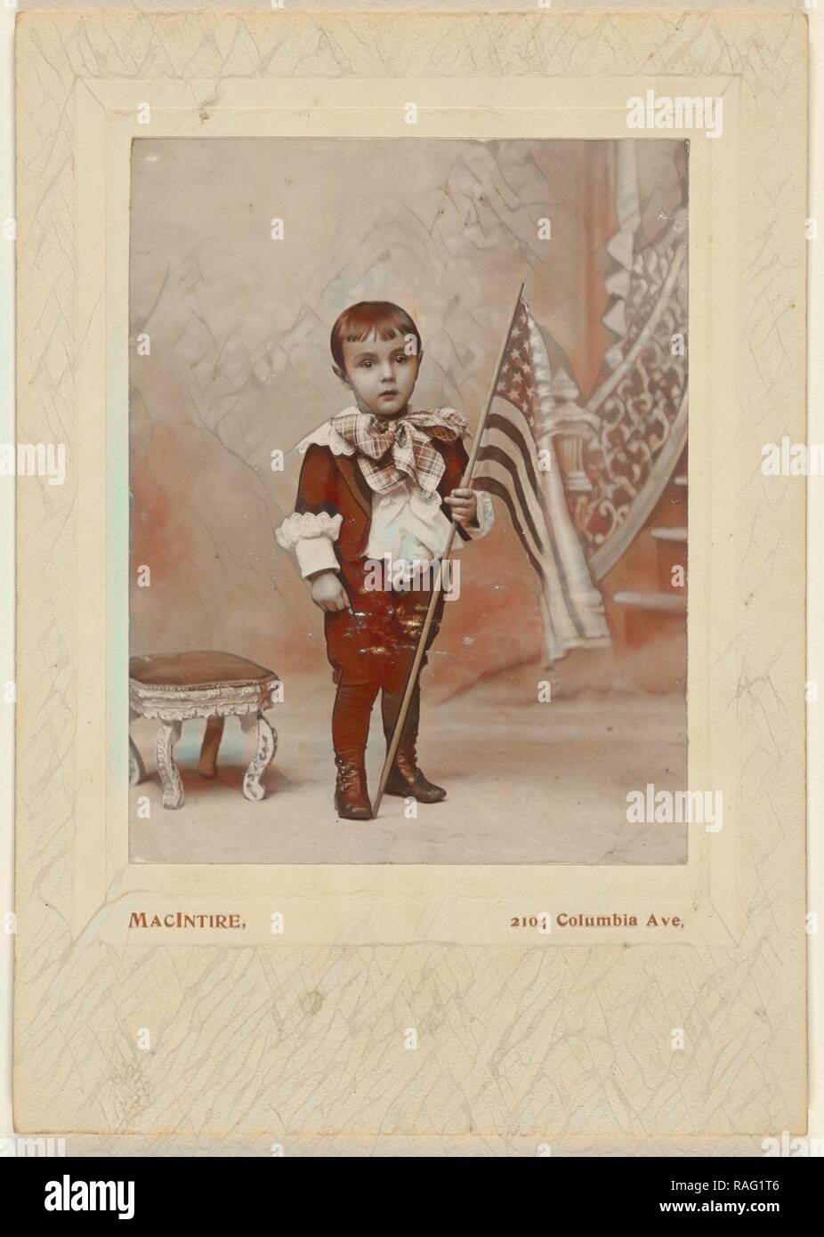 Little boy standing, holding an American flag, MacIntire (American ...