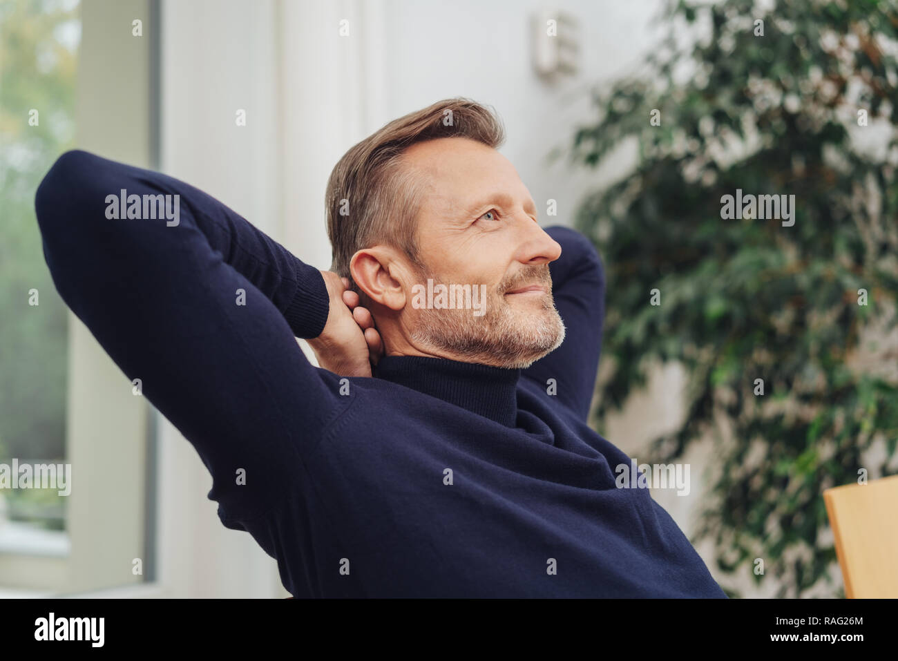 Leaning Back In Chair High Resolution Stock Photography and Images - Alamy
