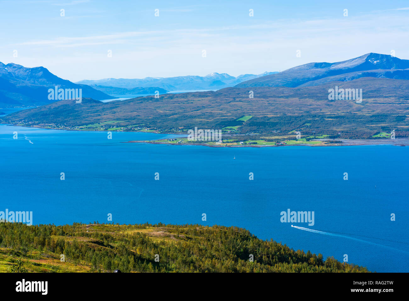 Aerial view of the hills around Tromso and Tromsoysundet strait in ...