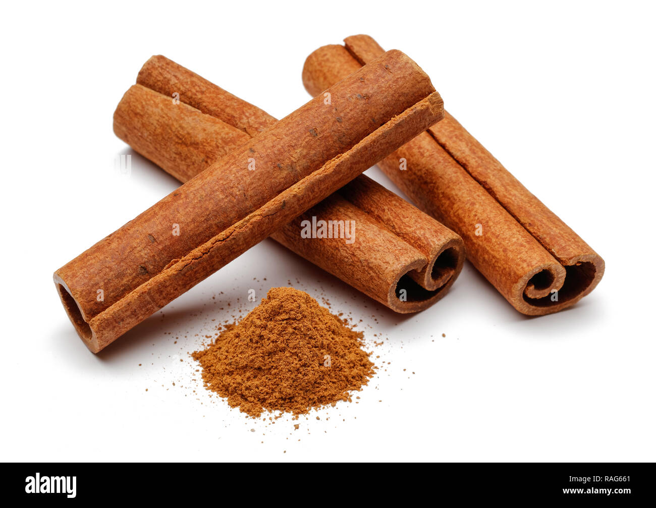 Cinnamon sticks and powder isolated on white background Stock Photo - Alamy