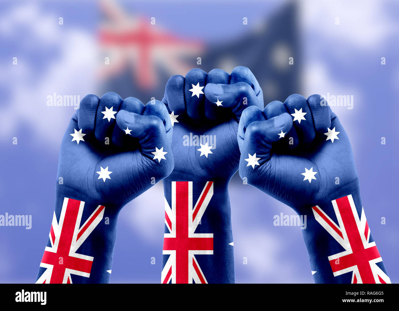 National flag of Australia painted in the hands of people with closed ...