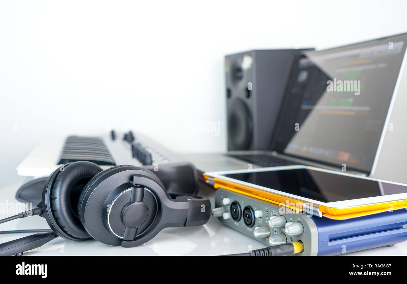Computer music work station with headphone and tablet Stock Photo - Alamy