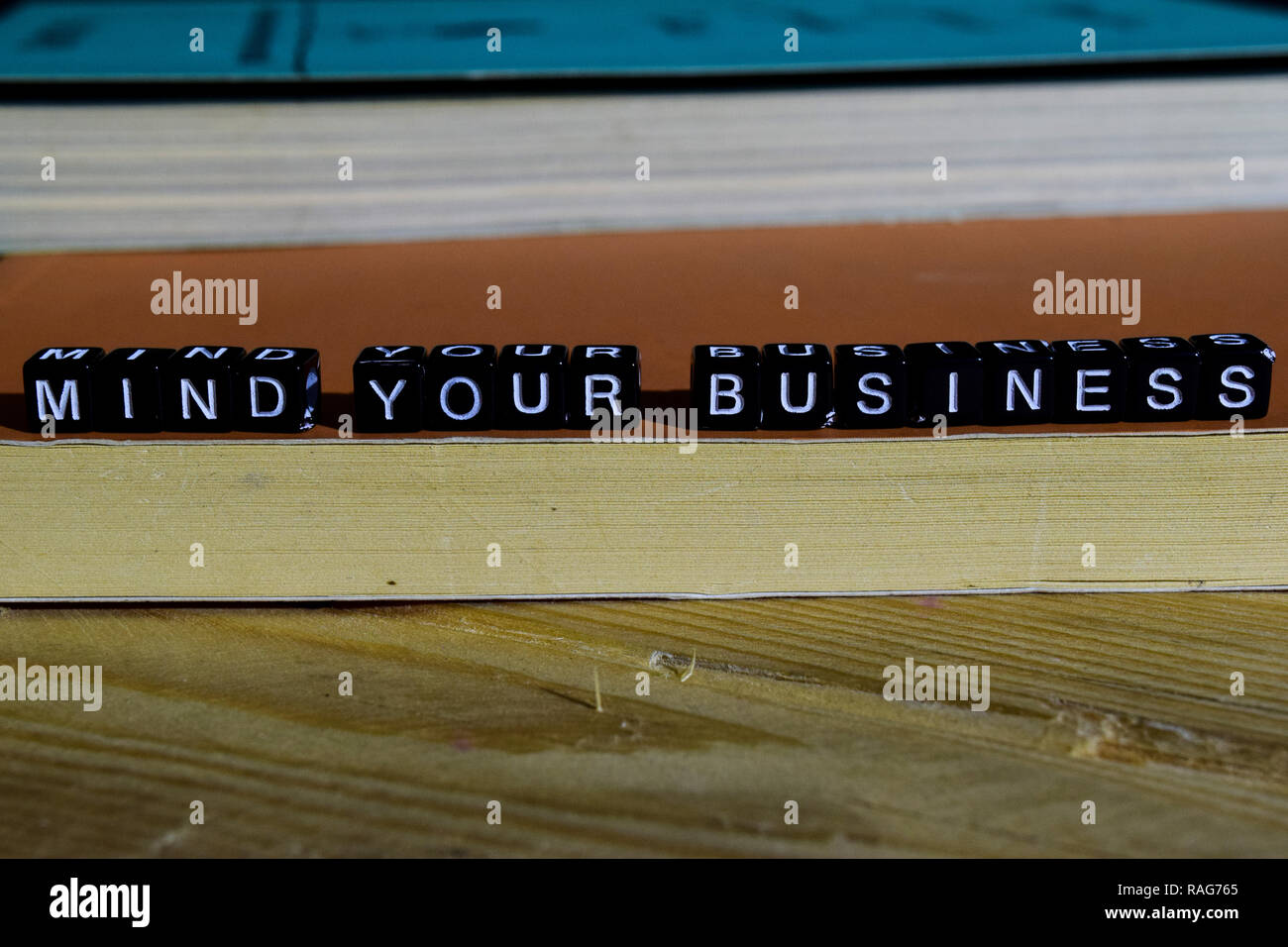 Mind your business on wooden blocks. Motivation and inspiration concept ...