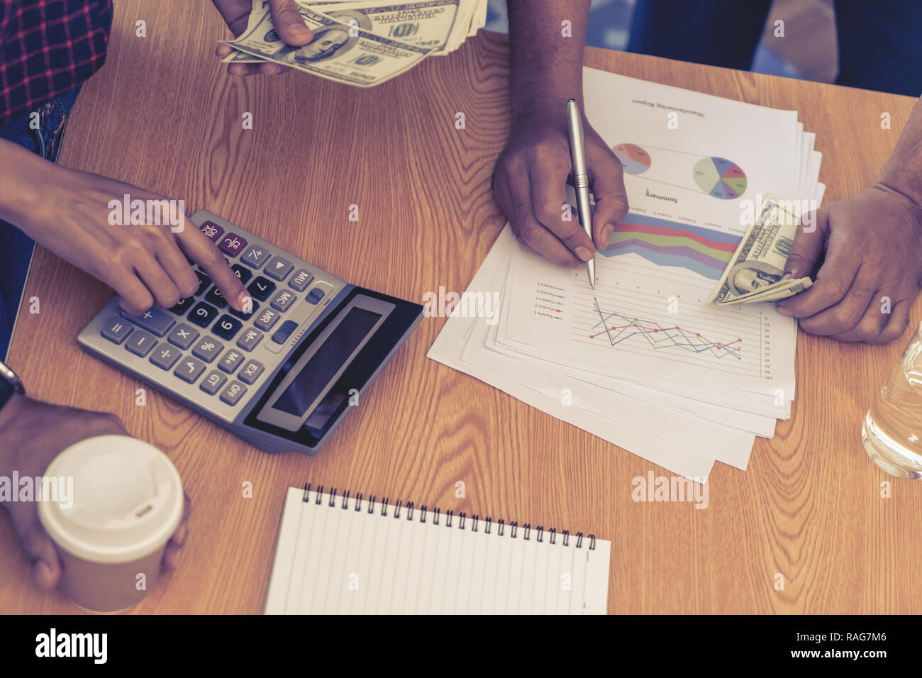 Business Data Chart and report on meeting table Stock Photo - Alamy