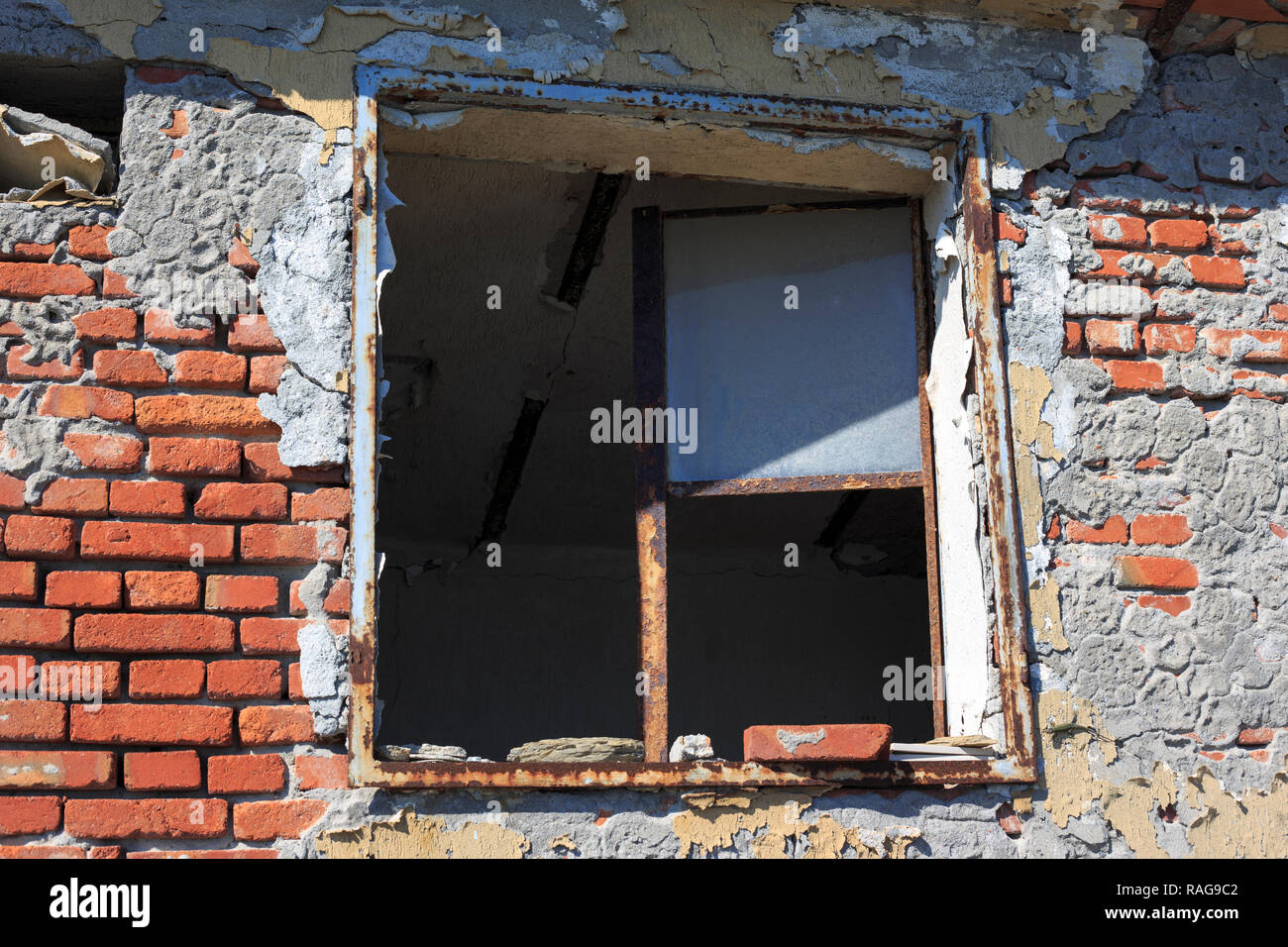 Red Brick Wall with rusty Window Stock Photo - Alamy
