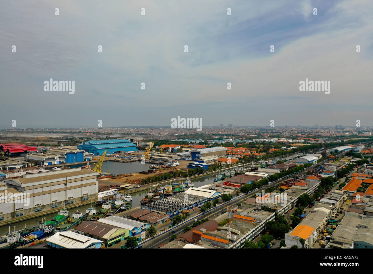 aerial view cargo and passenger seaport with ships and crane Tanjung ...