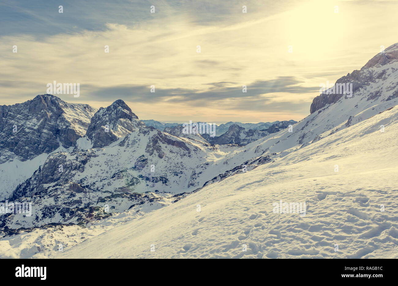 Spectacular winter mountain panorama with peaks covered with early snow ...
