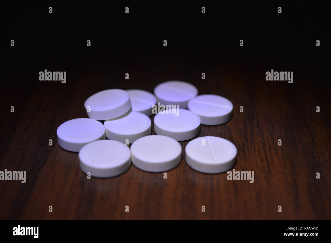 Pills on a table Stock Photo - Alamy