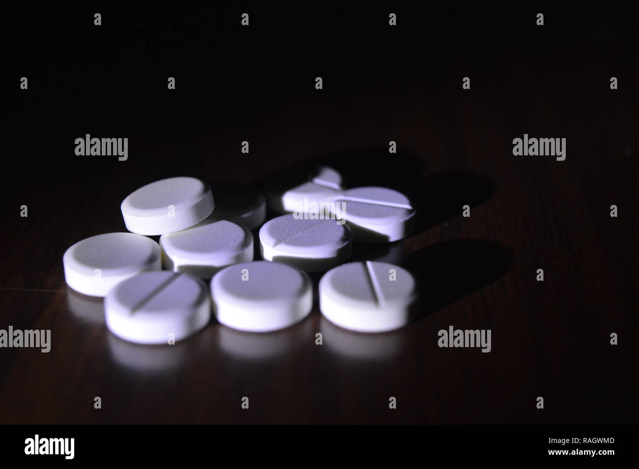 Pills on a table Stock Photo - Alamy