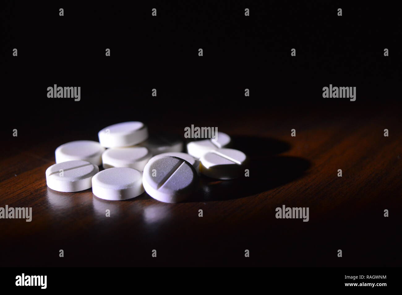 Pills on a table Stock Photo - Alamy