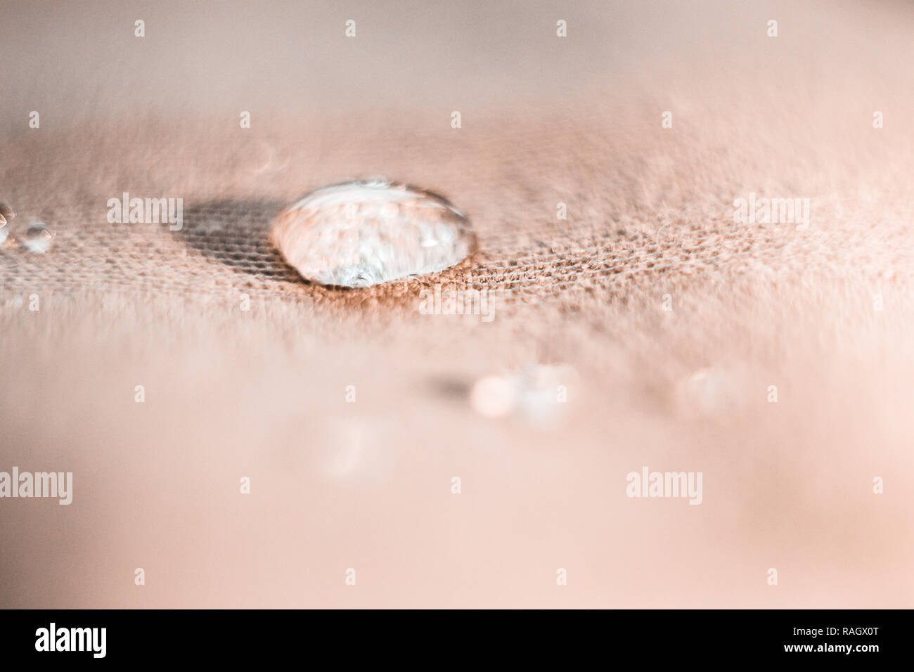A drop of water on the surface of the tissue. Macro view. select Stock ...