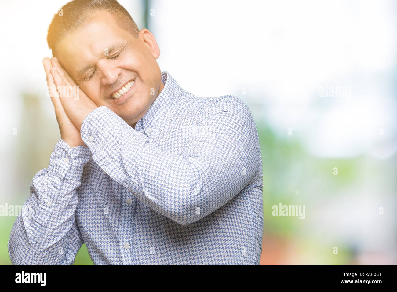 Handsome tired smiling indian man hi-res stock photography and images ...