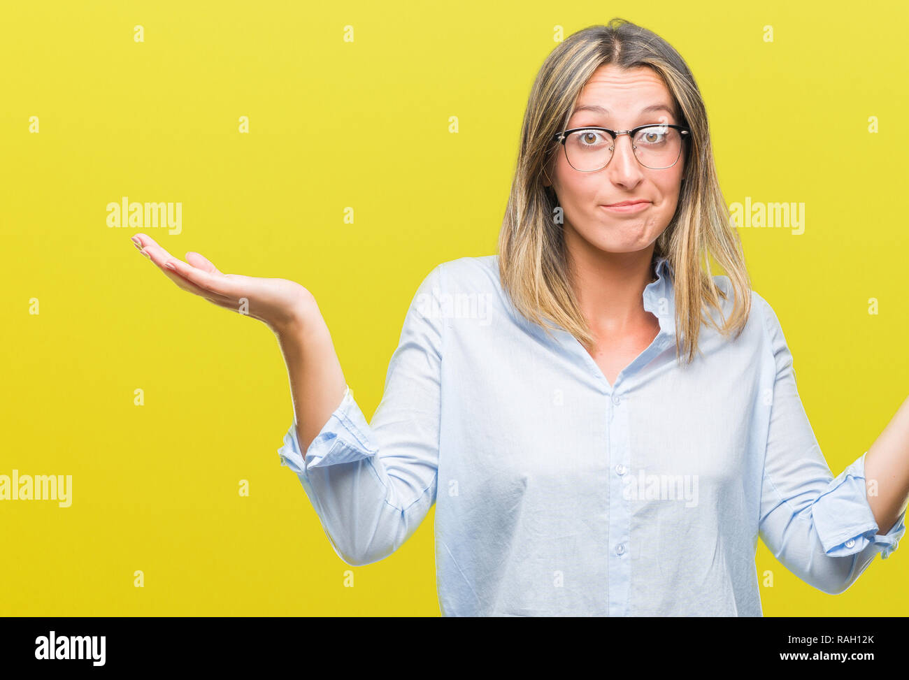 Young beautiful business woman over isolated background clueless and ...