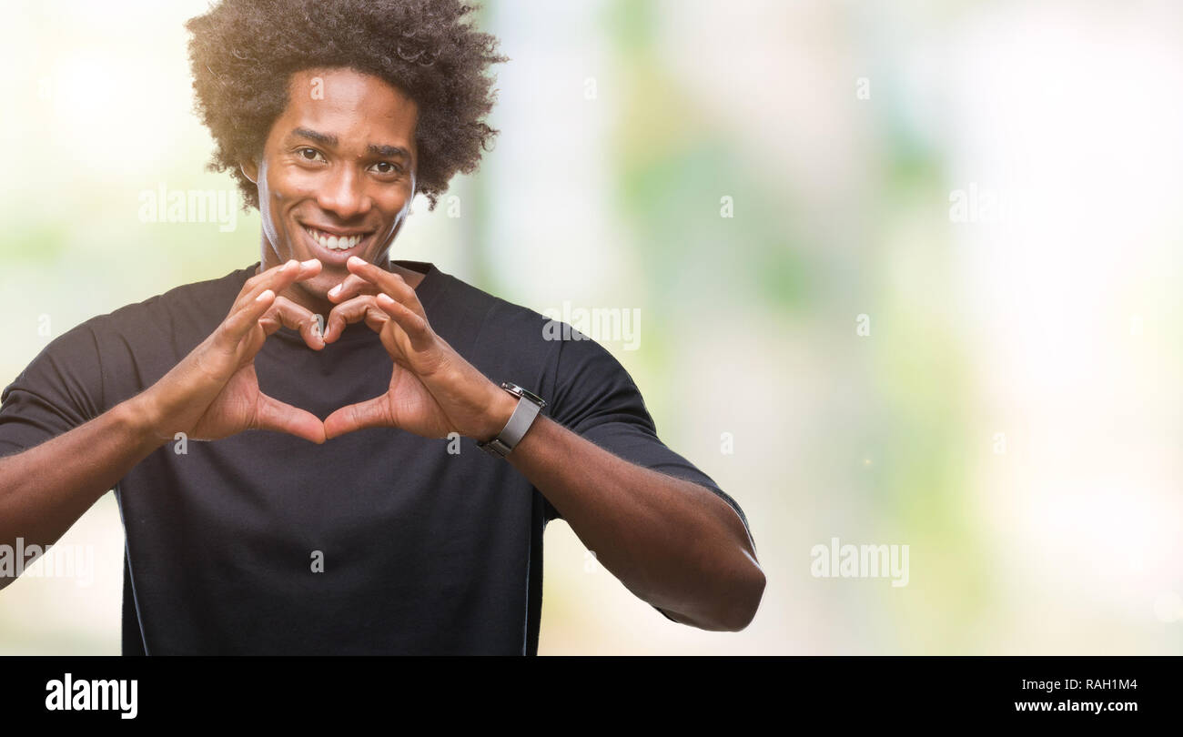 Afro american man over isolated background smiling in love showing ...