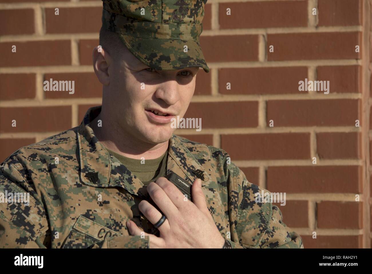 Sgt. Adam J. Cook, a member of the military police force on Parris ...