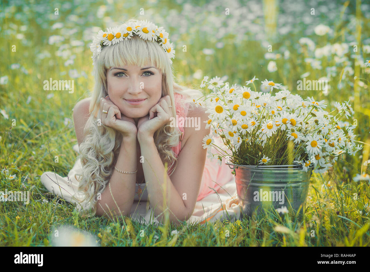 Beautiful blond young lady woman in pink airy dress happy smiling ...