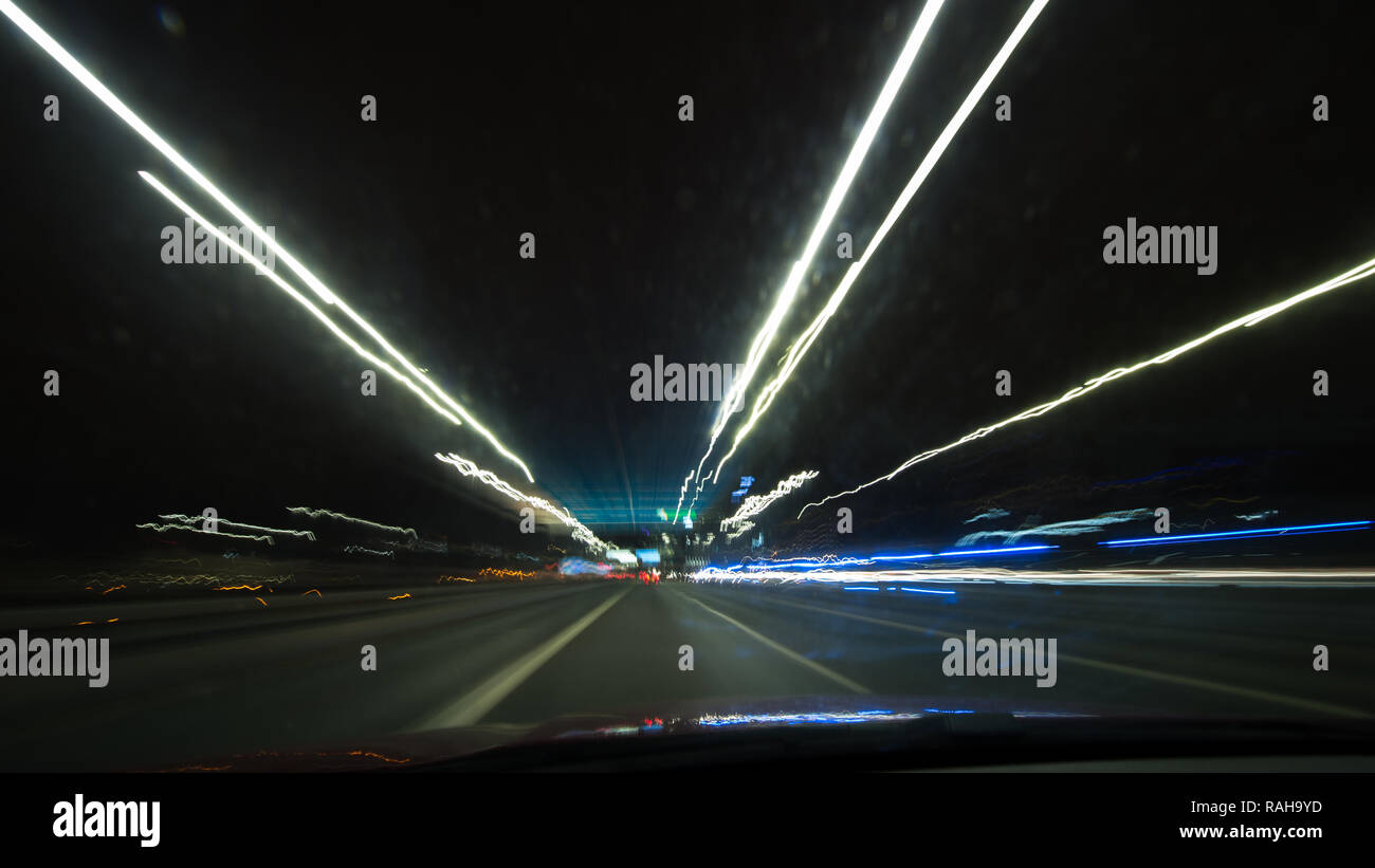 Driving on the M8 Motorway through Glasgow at night taken on a slow ...