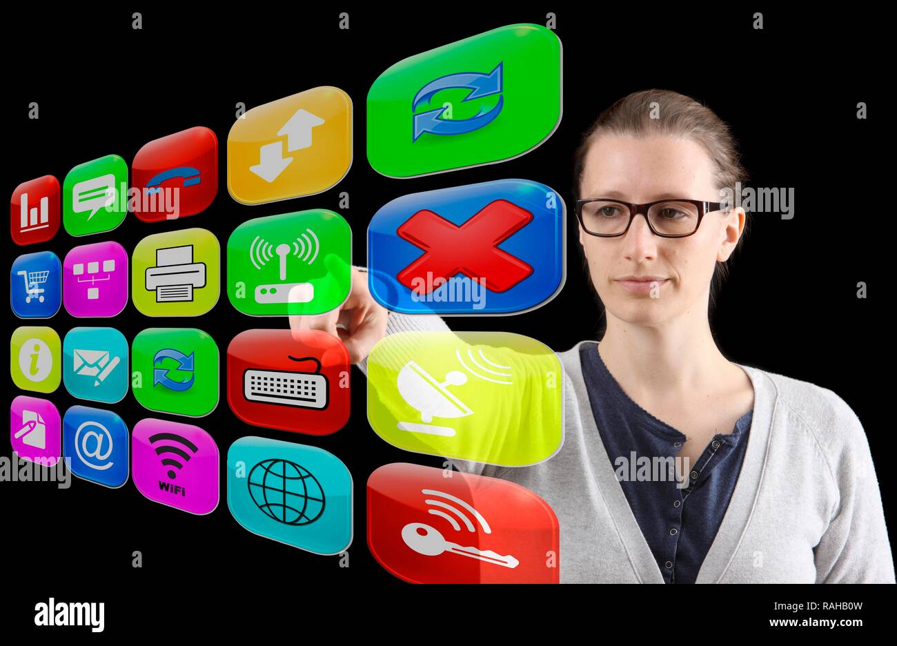 Woman using virtual icons, interactive user interface, symbolic image ...