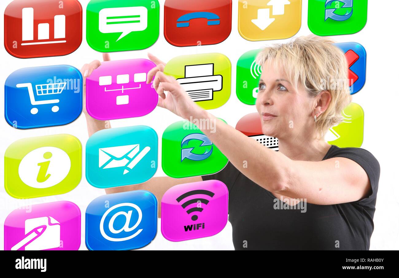 Woman using virtual icons, interactive user interface, symbolic image ...
