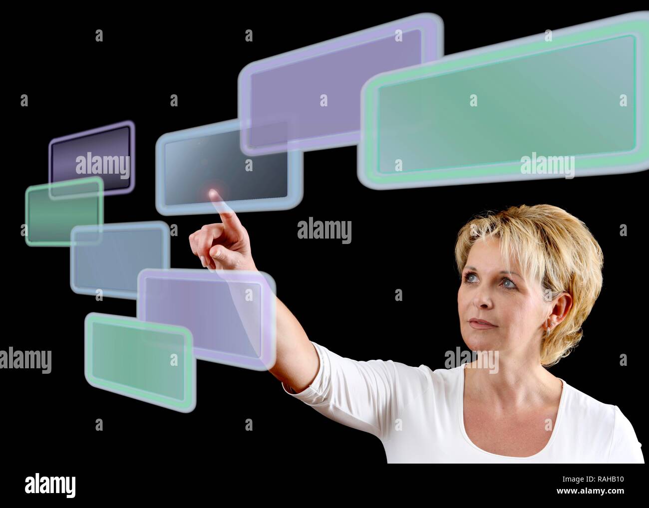 Woman using virtual icons, interactive user interface, symbolic image ...