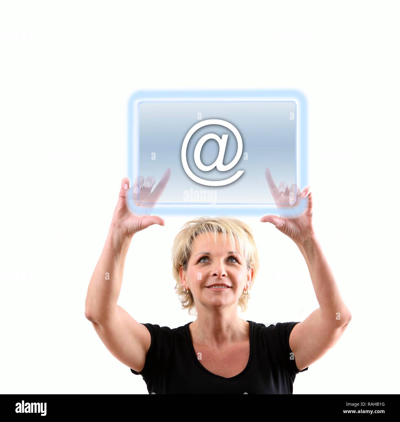 Woman using a virtual icon, interactive user interface, symbolic image ...