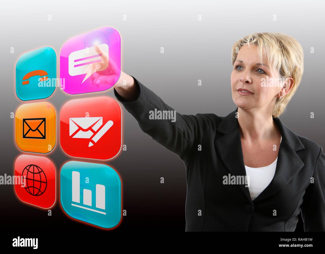 Woman using virtual icons, interactive user interface, symbolic image ...