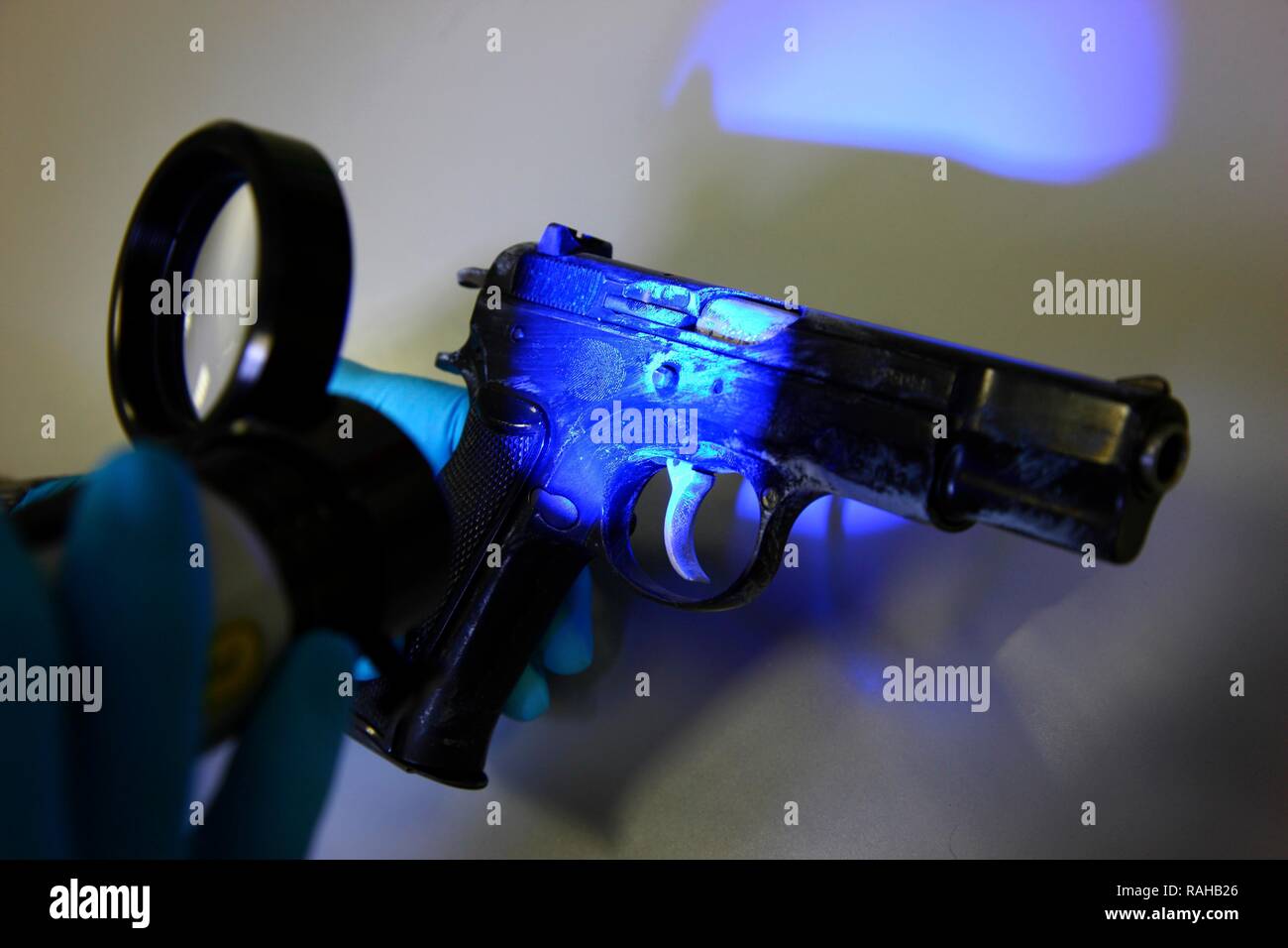 Examining guns hi-res stock photography and images - Alamy